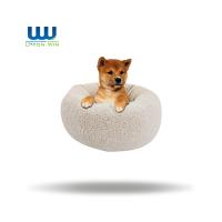 China Luxury Plush Calming Donut Washable Dog Bed Support Better Sleep for sale