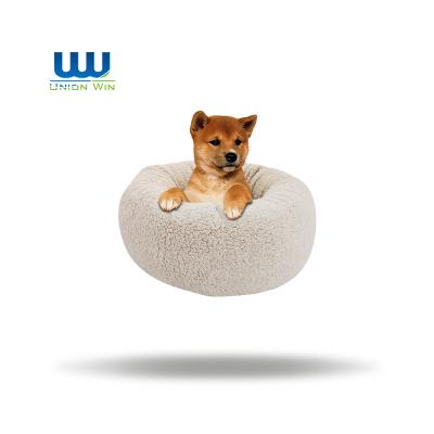 China Luxury Plush Calming Donut Washable Dog Bed Support Better Sleep for sale