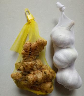 China Net Length 35m 80mesh plastic mesh bags For Ginger Garlic for sale