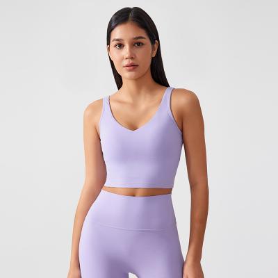 China Magenta Women Naked Feel Shaping Fabric Sports Bra with Removable Pads 78 Nylon 22 Spandex for sale