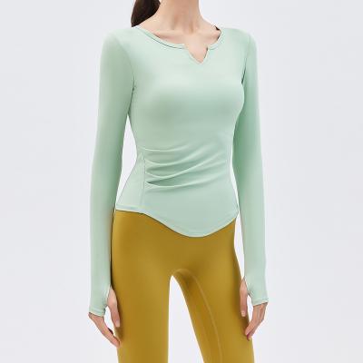 China Women's Long Sleeve Yoga Top Mint Green 80% Nylon 20% Spandex Thumb Hole Cuffs Slim Fit Activewear for sale