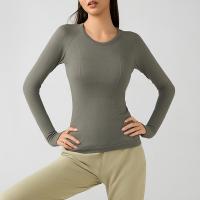 China Women's Seamless Long Sleeve Yoga Top Light Blue Moisture Wicking 65% Nylon 35% Polyester for sale