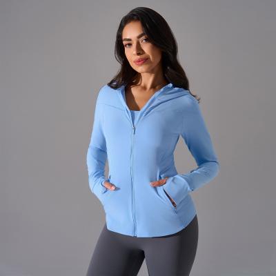 China Women's Light Yellow Full Zip Hooded Athletic Jacket 88% Polyester 12% Spandex Four Way Stretch with Pockets for sale