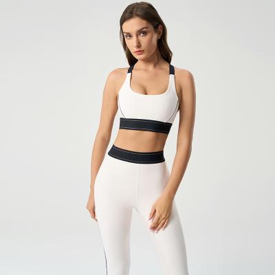 China Women White Black Contrast Yoga Sports Bra Leggings Set High Waisted Moisture Wicking 80 Polyester 20 Spandex for sale