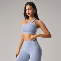 China Women's Nylon Spandex Activewear Set Asymmetric Sports Bra High Waisted Leggings 79% Nylon 21% Spandex for sale