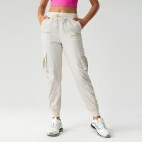 China Women's Beige Nylon Cargo Pants Drawstring Multi Pocket Lightweight Elastic Cuffed for sale