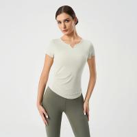 China Women's Ribbed Short Sleeve Yoga Top 85% Nylon 15% Spandex Stretch Slim Fit Activewear Light Beige for sale