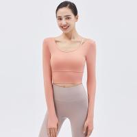 China Women's Ribbed Seamless Long Sleeve Crop Top 80% Nylon 20% Spandex Built in Bra Yoga Workout Shirt Peach Pink for sale