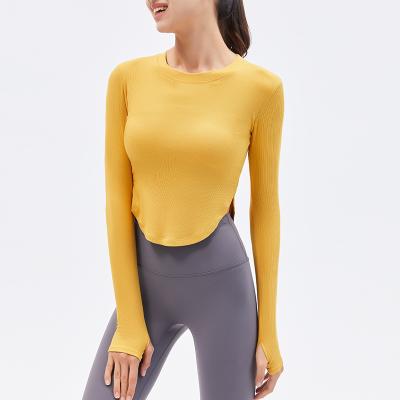 China Mustard Yellow Ribbed Long Sleeve Crop Top Women Buttery Soft Stretchy Yoga Shirt Thumb Holes Workout Running Gym 90% Viscose 10% Spandex for sale