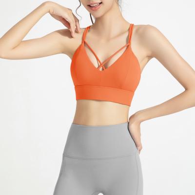 China Women Crisscross Front Sports Bra Nylon Spandex Low Support Yoga Pilates Daily Wear Orange S M L XL for sale