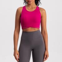 China Ribbed Twist Front Sports Bra for Women High Support Seamless Yoga Crop Top 220g Nylon Spandex for sale