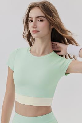 China Pastel Green Cropped Yoga Short Sleeve Top with Built in Bra 78% Nylon 22% Spandex Quick Dry for sale