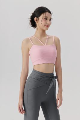 China Pink Ribbed Crisscross Strap Sports Bra for Yoga Fitness Supportive Nylon Spandex Sizes S M L XL for sale