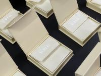 China Customized Beige Paper Magnet Box and Cotton Pouches for sale