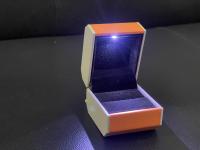 China Customized Your Logo-Orange Pu Leather LED Ring Box for sale