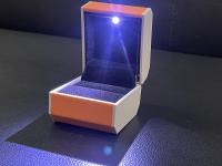 China Customized Your Logo-Orange Pu Leather LED Ring Box for sale