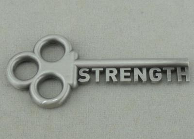 China Strength Key Souvenir Badge By Zinc Alloy Die Casting  Antique Silver Plating for sale