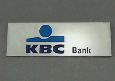 China Souvenir KBC Bank Badges Die Casting With Shiny Nickel , Adhesive Tap for sale
