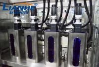 China 2 / 4 Nozzles Tracking Type Liquid Bottle Filling Machine High Speed for sale
