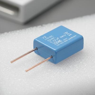 China Through Hole X2 Safety Capacitor 310VAC Rated Voltage Lead Wire Material Tinned Copper Designed for Electrical Noise Suppression for sale