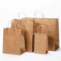 China Takeout Packaging Paper Bag Logo Printing Varnishing Kraft Paper Bag TUV for sale