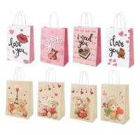 China Valentines Kraft Paper Handbag CMYK Kraft White Paper Gift Bag Debossing for sale