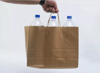 China LOGO Printing Kraft Takeaway Bags shopping Gift Packaging Bag Biodegradable for sale