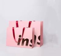 China Kraft Recycled Carrier Bag Paperboard Drawstring Handle Shopping Bag for sale