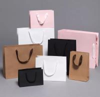 China Kraft Recycled Carrier Bag Paperboard Drawstring Handle Shopping Bag for sale