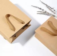 China Handbag Kraft Paper Bag / Gift Bag Recyclable Drawstring Handle for sale
