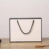 China Recyclable Kraft Paper Handbag Cardboard Rope Handle Gift Bag ISO for sale