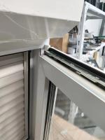 China Upvc White Aluminum Frame Glass Window With Automatic Motor Rolling Shutter for sale