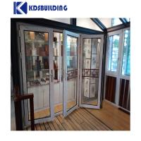 China KDSBuilding Plastic Glass UPVC Partition PVC Bi Fold Doors  Mosquito Net Door Folding Door Entry Exterior for sale