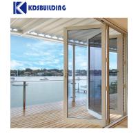 China KDSBuilding Aluminum Triple Hurricane Impact Glass Horizontal Sliding Folding Doors for sale