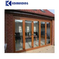 China Competitive Price Wooden Color Aluminum Double Tempered Hurricane Proof Glass Bifold Door Villa for sale