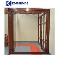China KDSBuilding Entrance Security Stainless Steel Grill Design Champagne Aluminium Bifold Door for sale