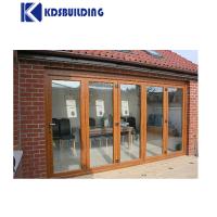 China KDSBuilding Exterior Triple Pane  Soundproof Insulated Main Entrance Wooden Folding Door Design for sale