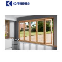 China KDSBuilding Solid Teak Double Glass Horizontal Folding Garage Paint Colors Wood Doors for sale