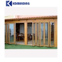 China KDSBuilding Cheap Price Front Folding Door Designs In Teak Wood Bifold for superhouse for sale