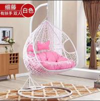 China Modern Outdoor Rattan Wicker Double Seat Hanging Egg Patio Swing Chair with Metal Stand for sale