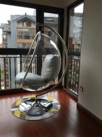 China Outdoor Floor Stand Acrylic Hanging Swing Chair for Living Room Garden 106*68*130 cm for sale