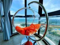 China Outdoor Floor Stand Acrylic Hanging Swing Chair for Living Room Garden 106*68*130 cm for sale
