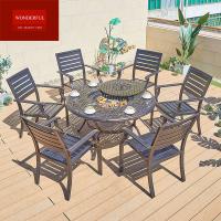 China Outdoor Patio Dining Set with Round BBQ Table and Luxury Cast Aluminum Garden Furniture for sale