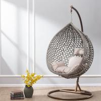 China Waterproof Fabric Design Modern Black Rattan Hanging Egg Chair With Stand and Basket for sale