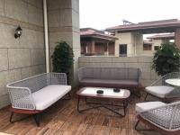 China Outdoor Rattan Sofa Set for Comfortable and Fashionable Garden Seating for sale