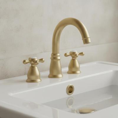 China Classic Round Brass Basin Faucet Brushed Brass Finish Curved Spout with Pop Up Waste Set Traditional Style for sale