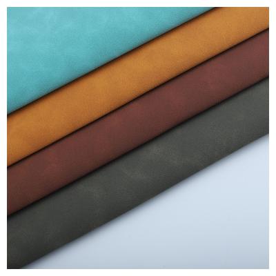 China Faux Leather Fabric Pu Coated Microfiber Fabric Leather For Handbags for sale