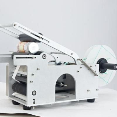 China DUOQI MT-50 Bottle Sticker Labeling Machine 20-40 pcs/min Speed for 10-150mm Round Bottles for sale