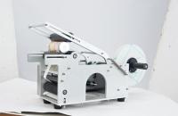 China MT-50 Manual Wine Bottle Labeling Machine 120W 20-40pcs/min for 10-150mm Bottles for sale