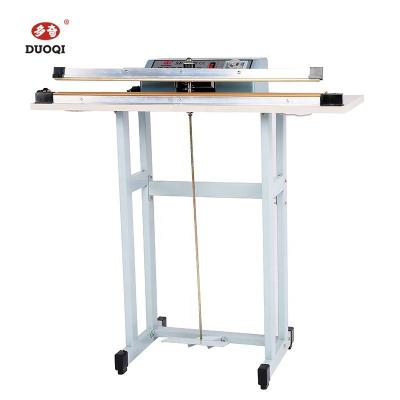 China DUOQI SF-600 Iron Foot Pedal Sealer 600mm Semi-Automatic Heat Sealing Machine 750W for sale